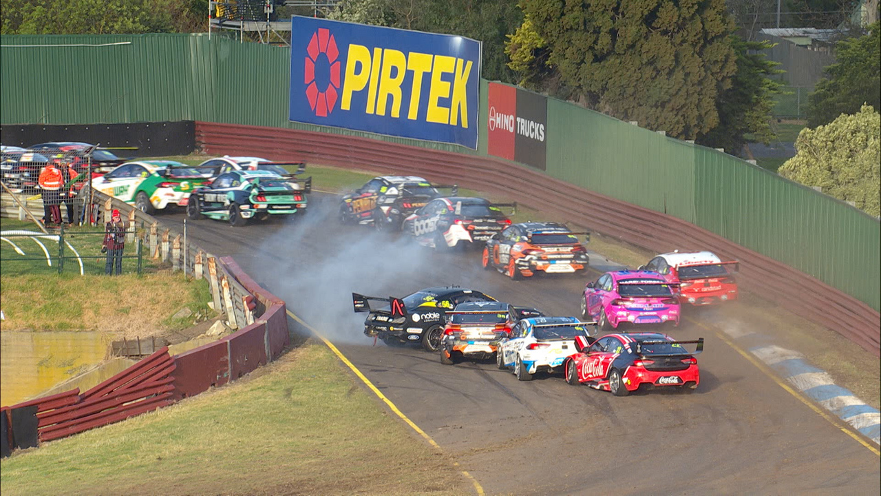 Kostecki's muddy spin wipes out backmarkers | Supercars