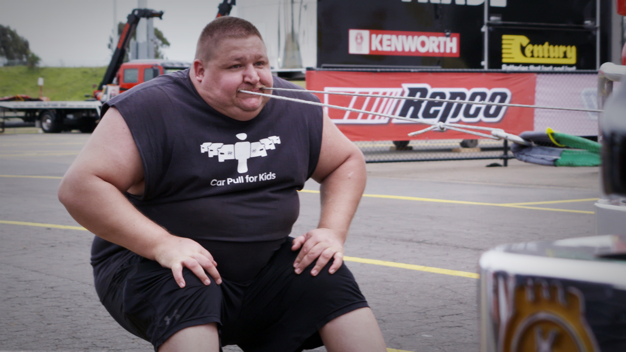 Strongman pulls Supercars transporter with his teeth | Supercars